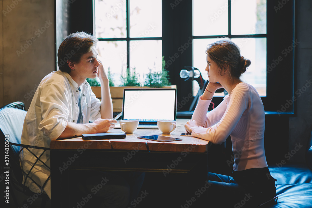 Hipster guy having seriously conversation with attractive friend ...