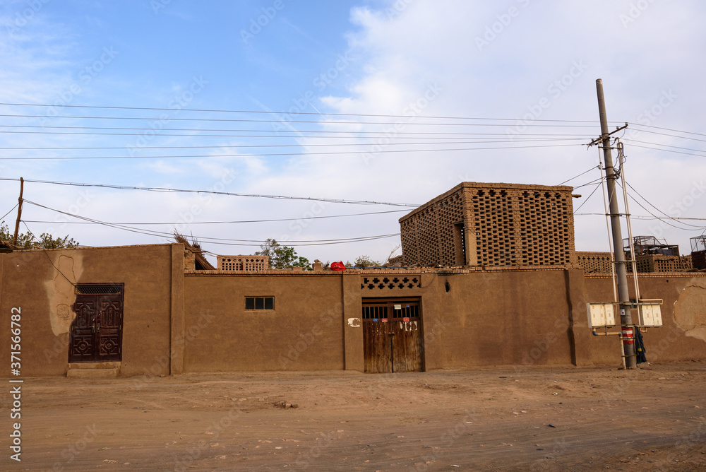 Traditional sun-dried mud brick houses in Turpan, Xinjiang Province ...