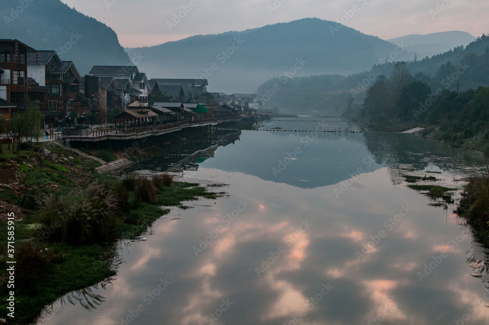 The sunrise scenery of Xibu Street in Zhangjiajie, Hunan province is ...