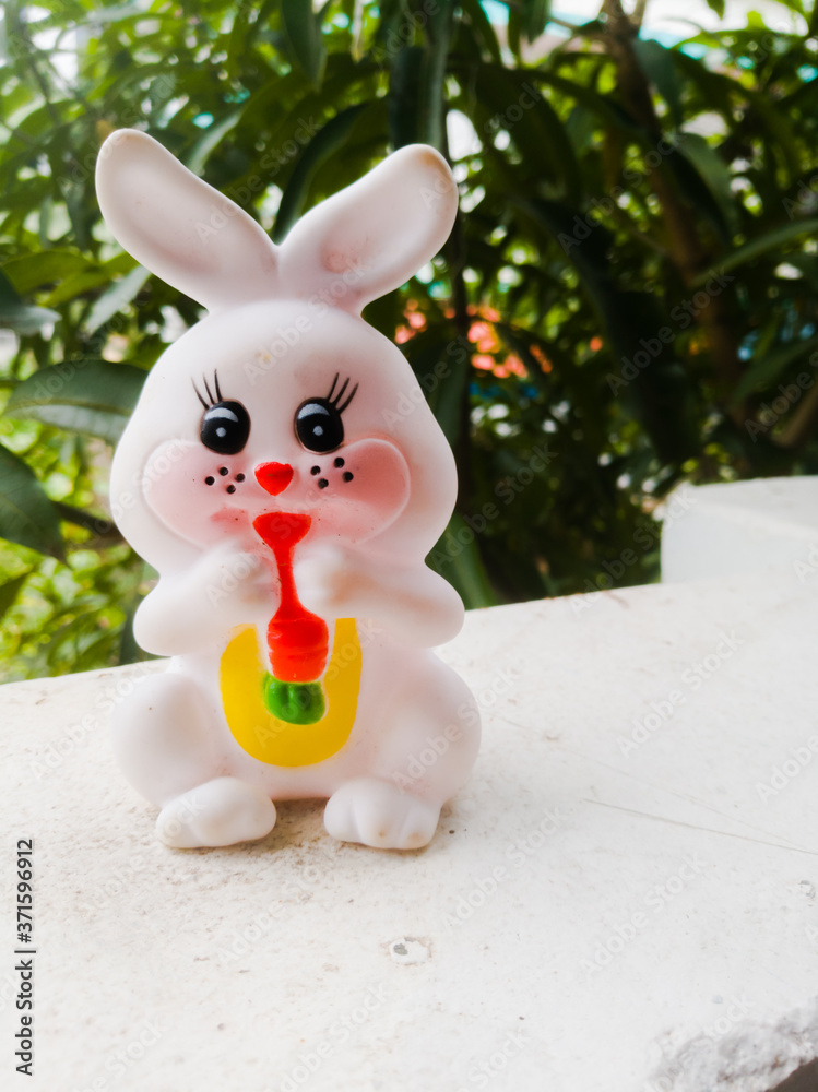Toy Rabbit of small size in white color and have black eyes. Stock ...