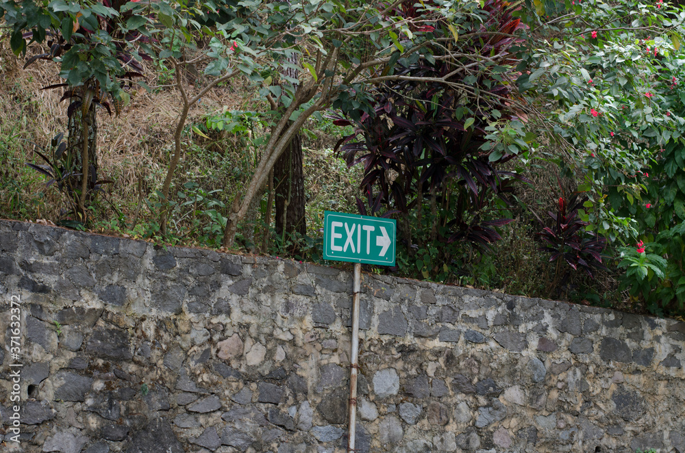 Exit Way sign inside Zoo with forest situation Stock Photo | Adobe Stock