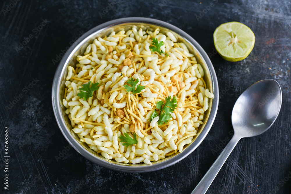 Murmura spicy puffed rice Pori, Jhal Muri, Borugulu and lemon, in ...