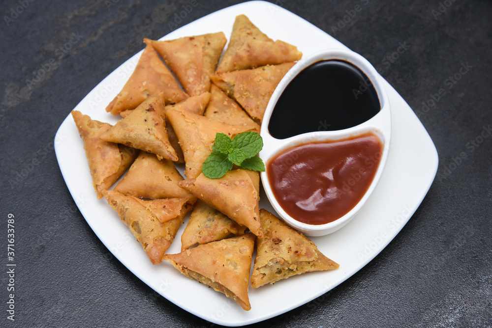 Chicken samosa, Pakoda deep fried snack in coconut oil Kerala, India ...