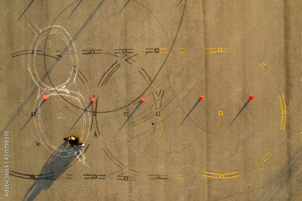 top down wide aerial view of one rider practicing on an advanced ...