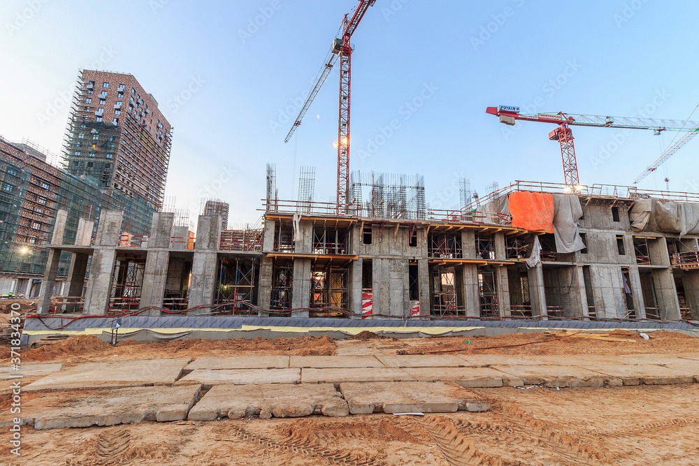 Reinforcement work and installation of formwork. Concrete is poured in ...