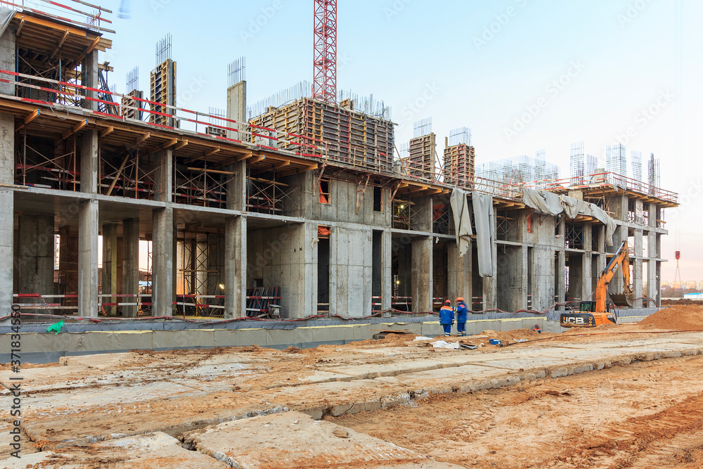 Reinforcement work and installation of formwork. Concrete is poured in ...