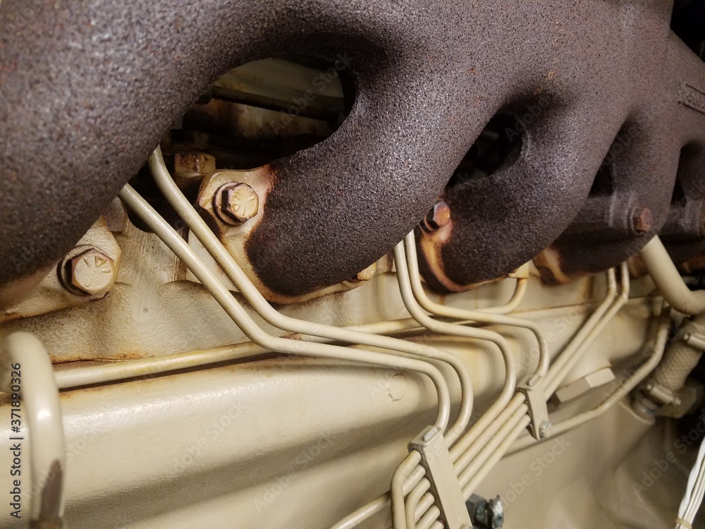 Diesel engine, fuel lines and exhaust manifold Stock Photo | Adobe Stock