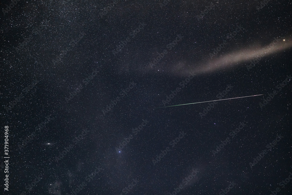 Flying meteor in the dark night sky. Perseids meteor shower 2020. Stock ...