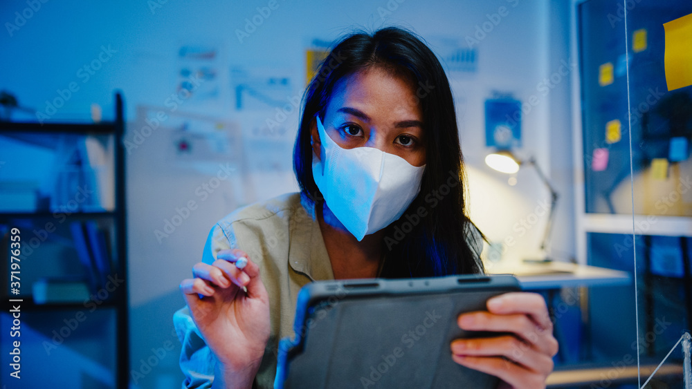 Asia businesswoman wear face mask social distancing in situation for ...