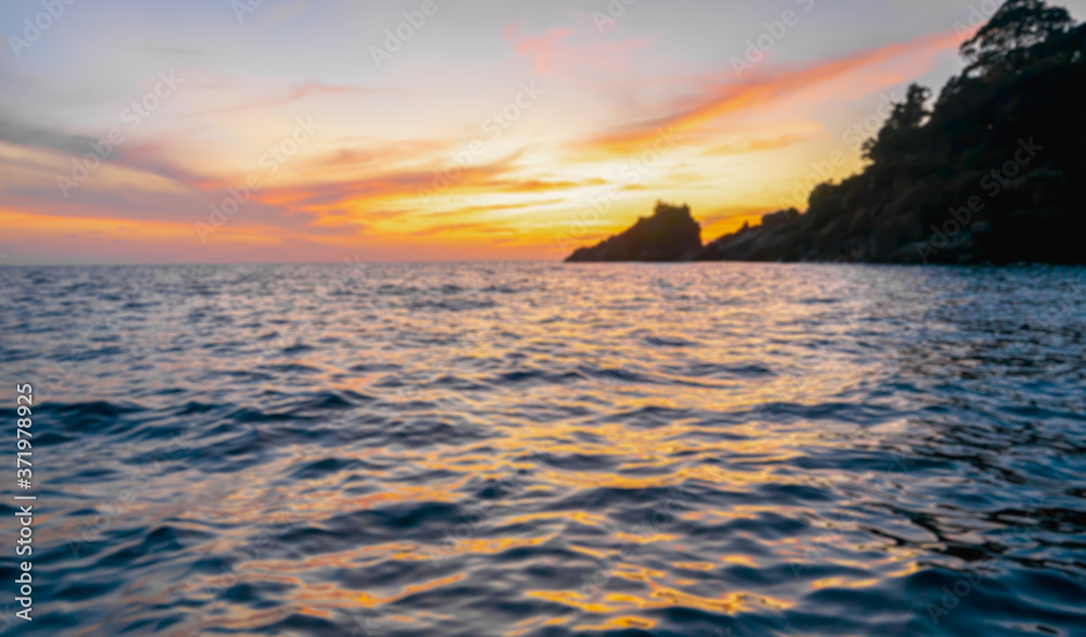 Blur background of indigo blue ocean in the evening, the sun was ...