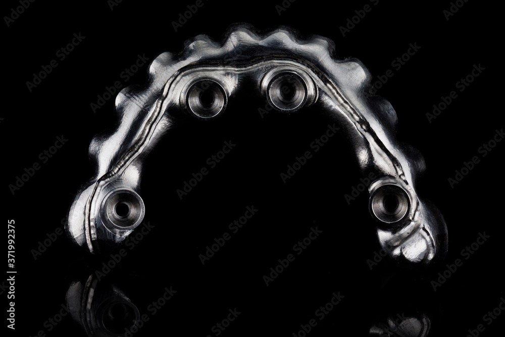 dental titanium bar from the side of fixation of the prosthetics ...