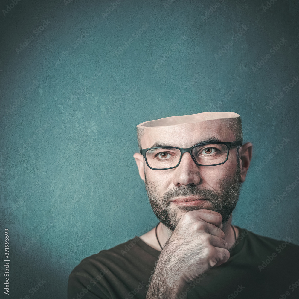 Foto de Portrait of man with empty open head. do Stock | Adobe Stock