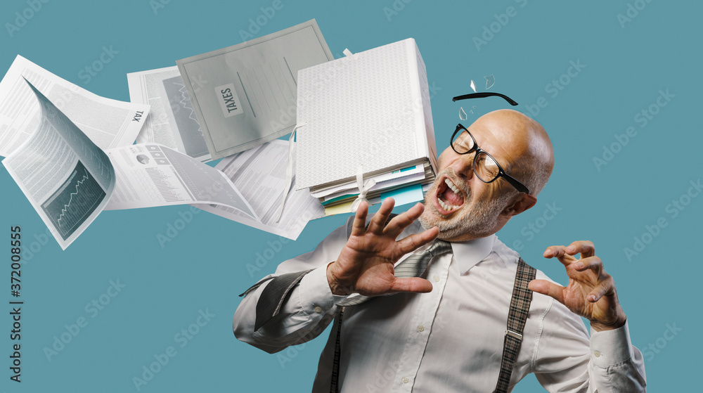 Paperwork hitting a businessman's head Stock Photo | Adobe Stock