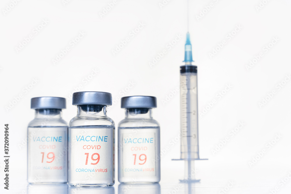 Transparent vials, syringe with new vaccine for covid-19 coronavirus ...