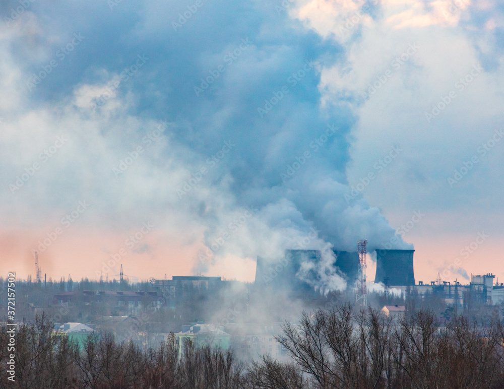 Smoke from pipes at the plant pollutes the environment Stock Photo ...