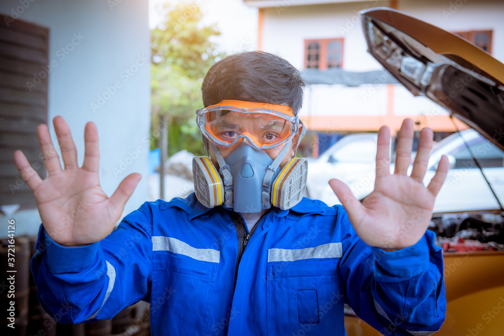 Engineer industry wearing safety uniform ,gas mask show hand signal no ...
