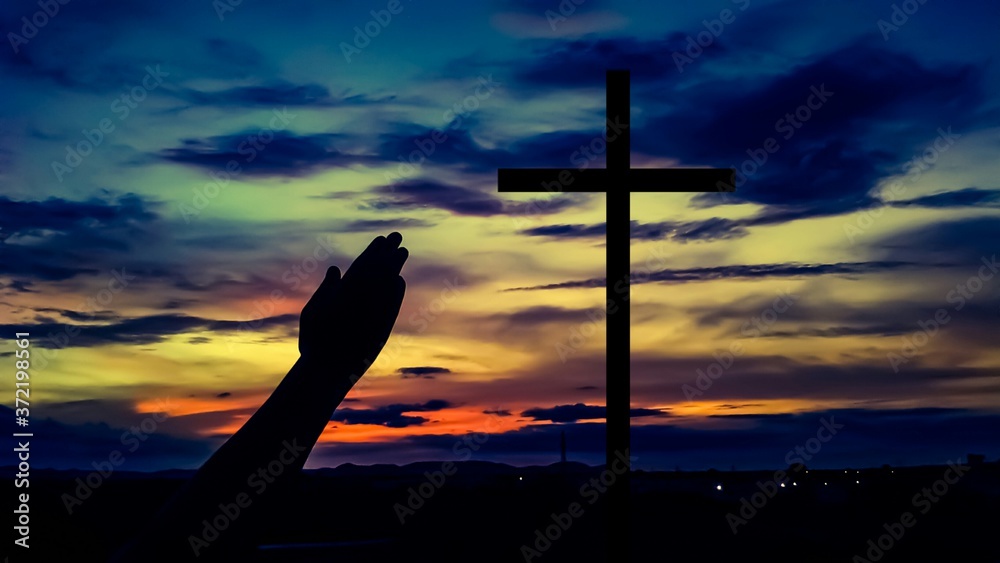 Praying hands with jesus cross symbol and dark evening background Stock ...