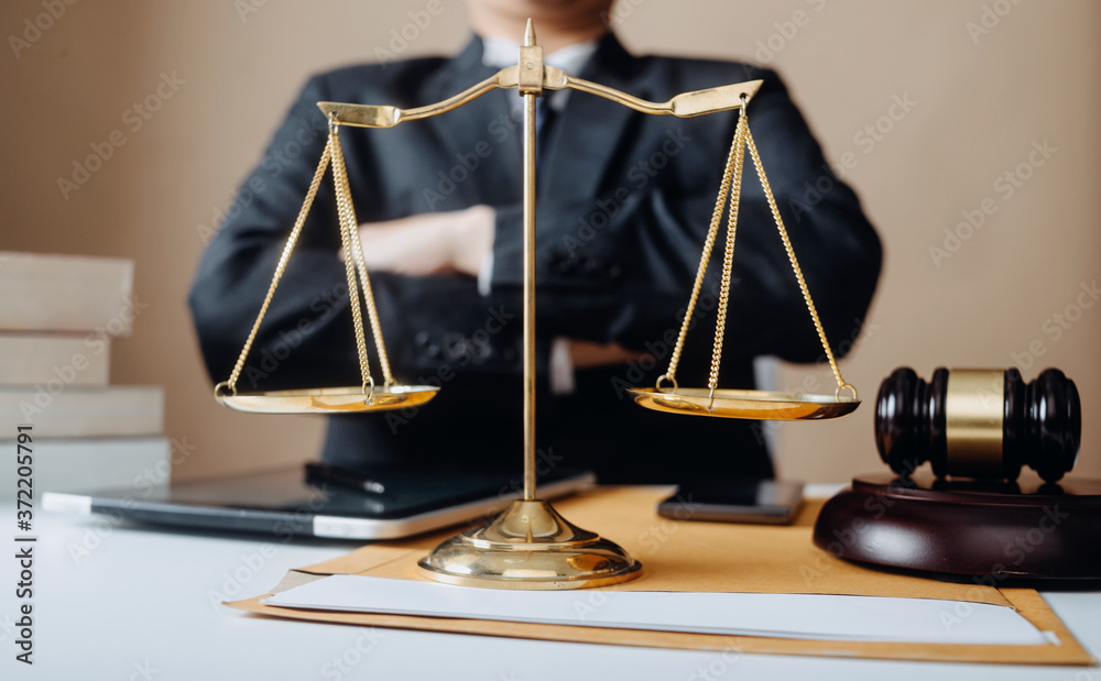 Justice and law concept.Male judge in a courtroom with the gavel ...