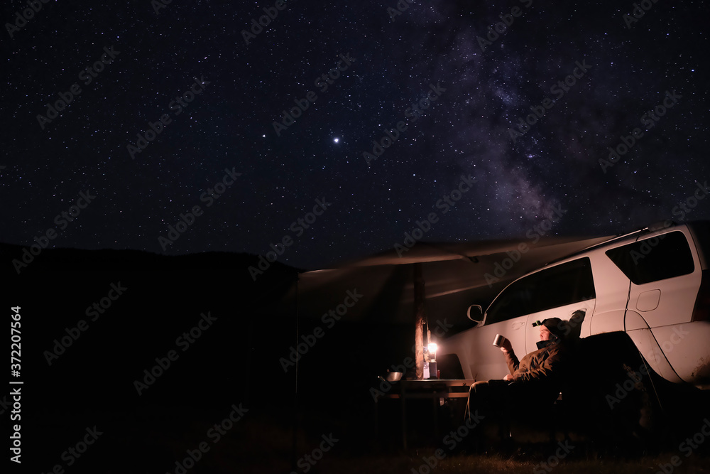 Overlander are resting at night near car concept. Car with tent or ...