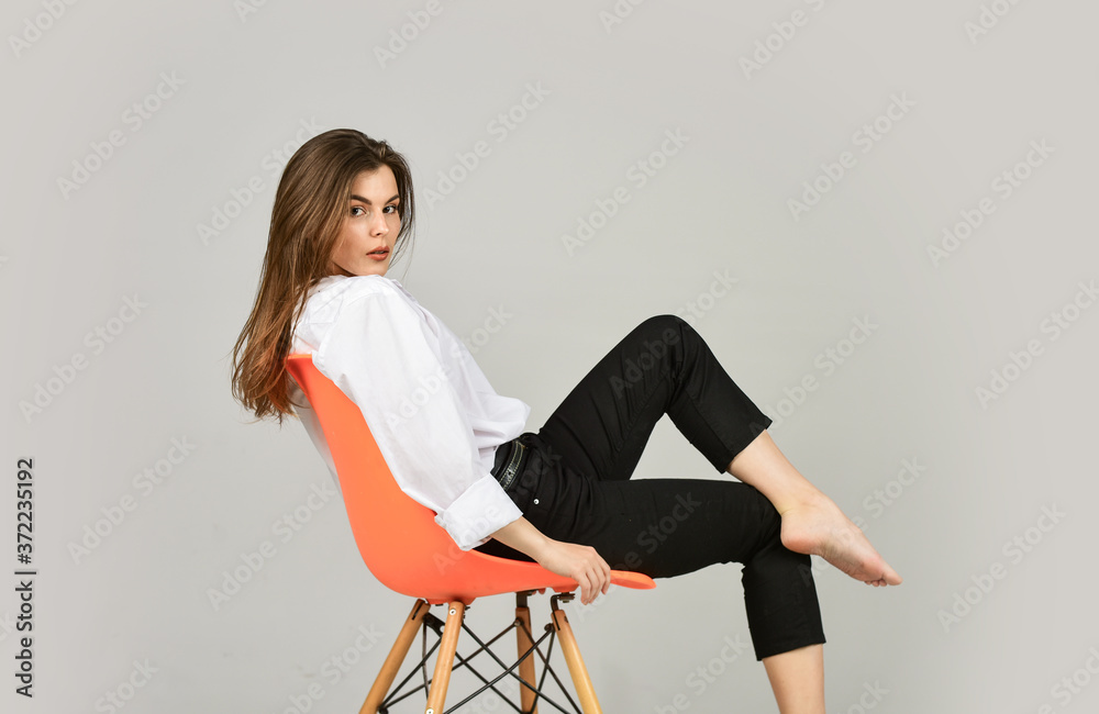 Fashion model looking casual. Stay home. Summer makeup. Girl sit on ...