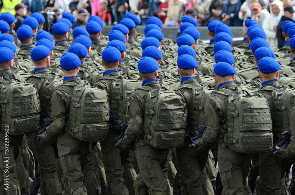 Soldiers marching on a square during military parade Stock Photo ...