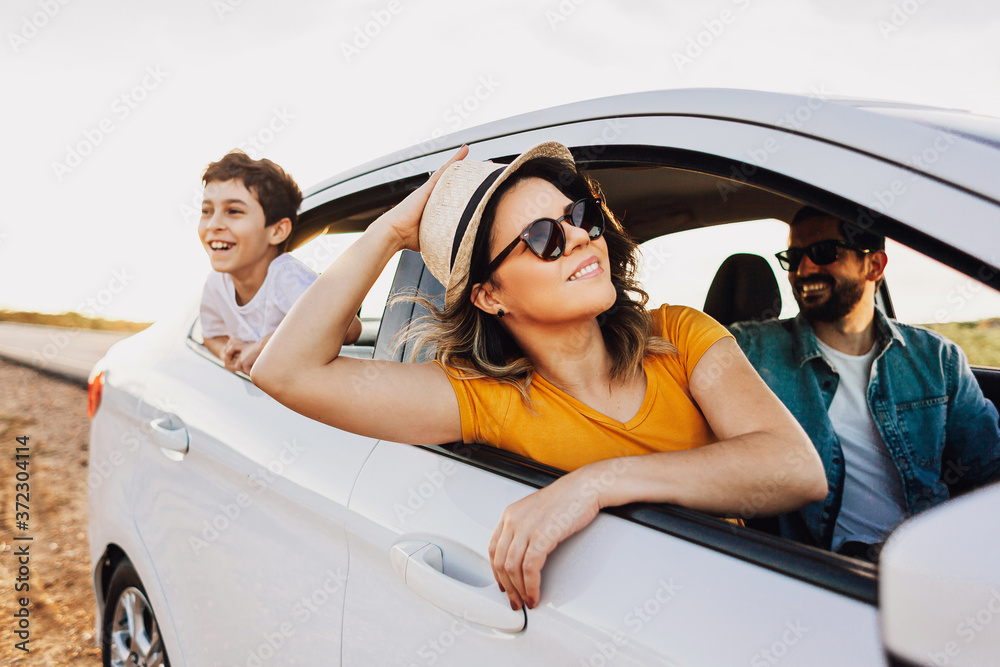 Family road trip. Latin family traveling locally by car. Stock Photo ...