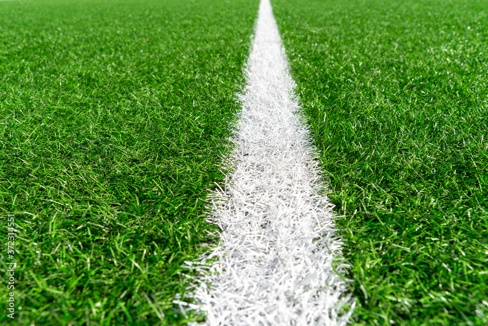 Poster Green artificial grass turf soccer football field background ...