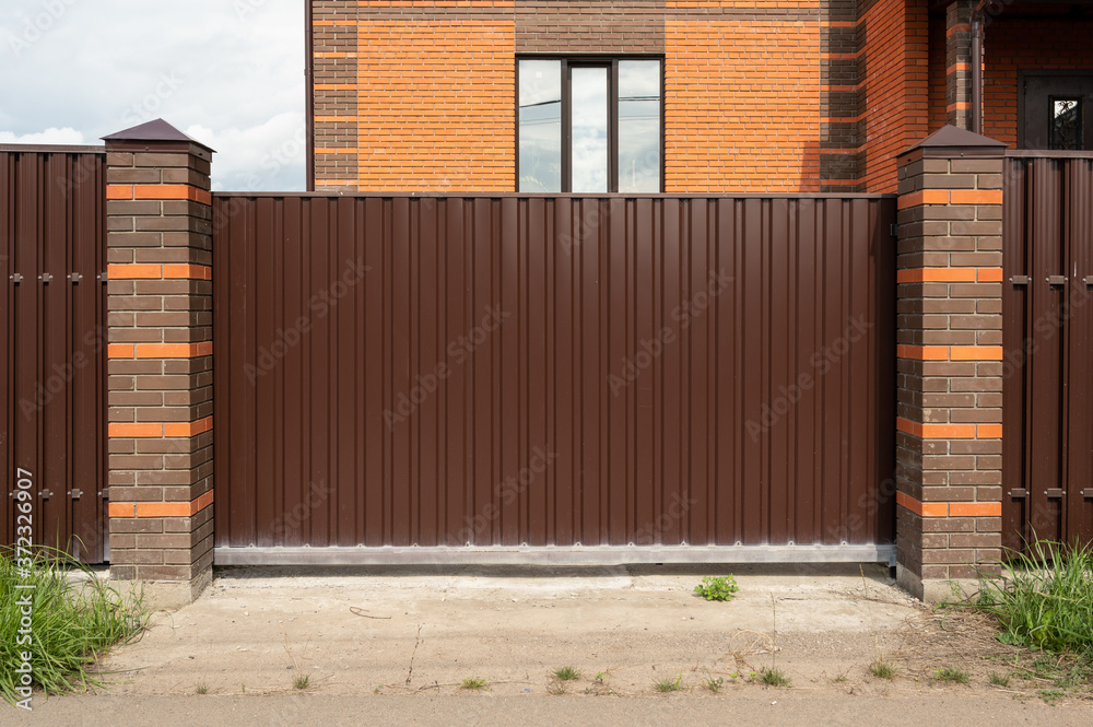 Automatic sliding gates for cars at private building Stock Photo ...