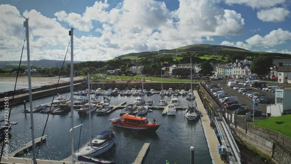 Irish ocean pier town aerial view: port landscape with yachts against ...