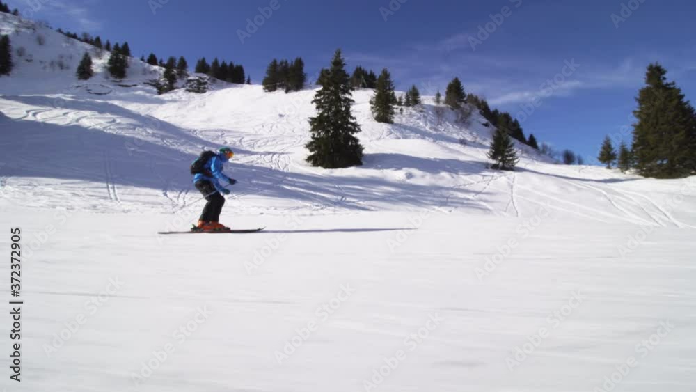 Professional advanced skier skiing on slopes in the Swiss alps Stock ...