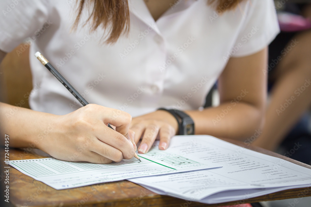 high school,university student study.hands holding pencil writing paper ...