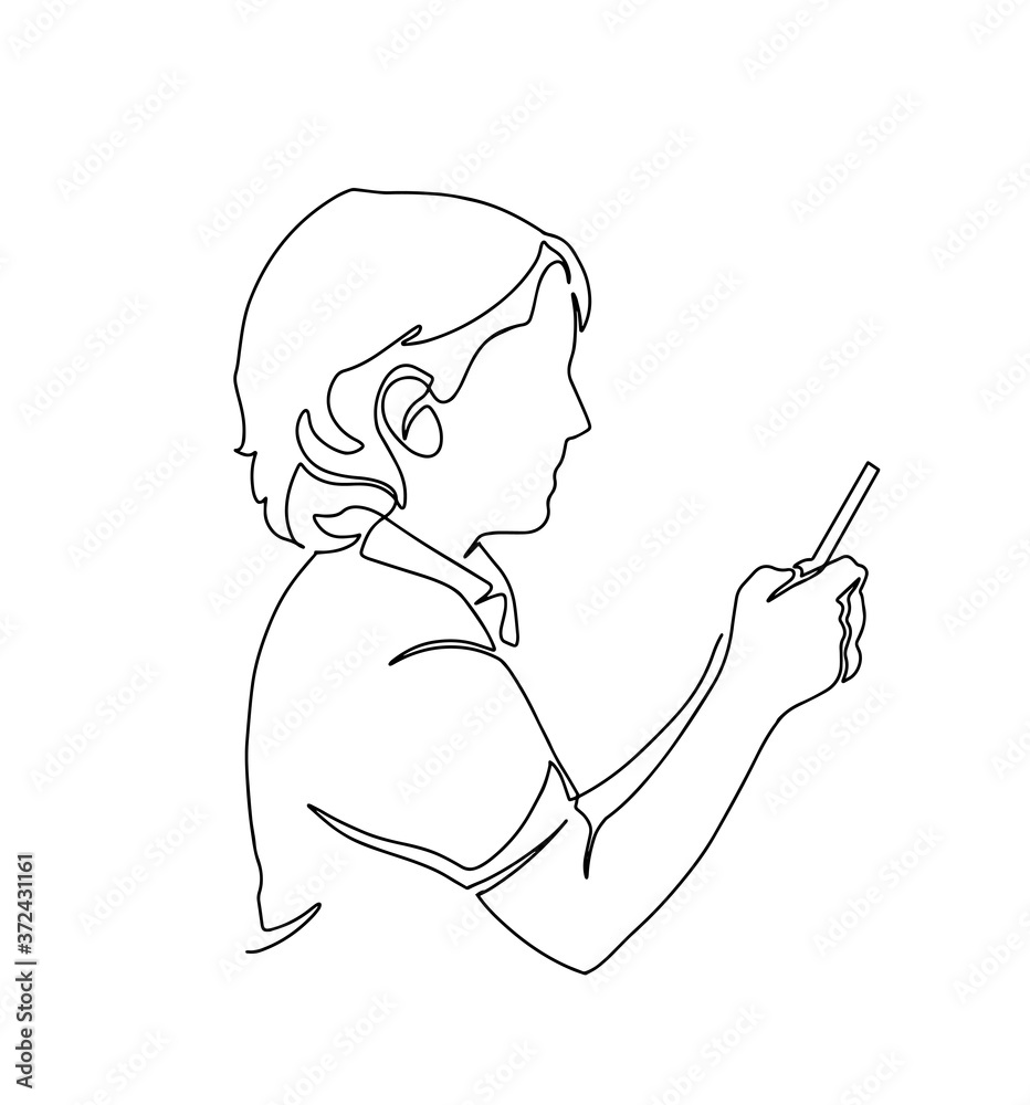 Portrait of a satisfied cute little kid playing games on smartphone ...
