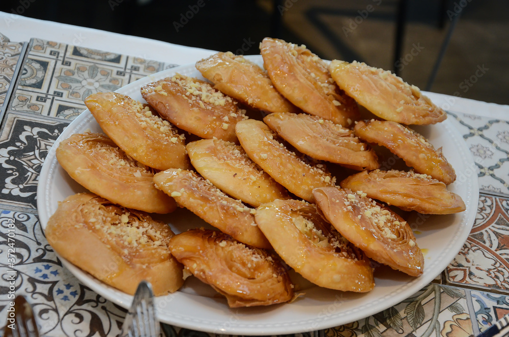 A tasty and sweet plate full of fresh traditional Moroccan handmade ...