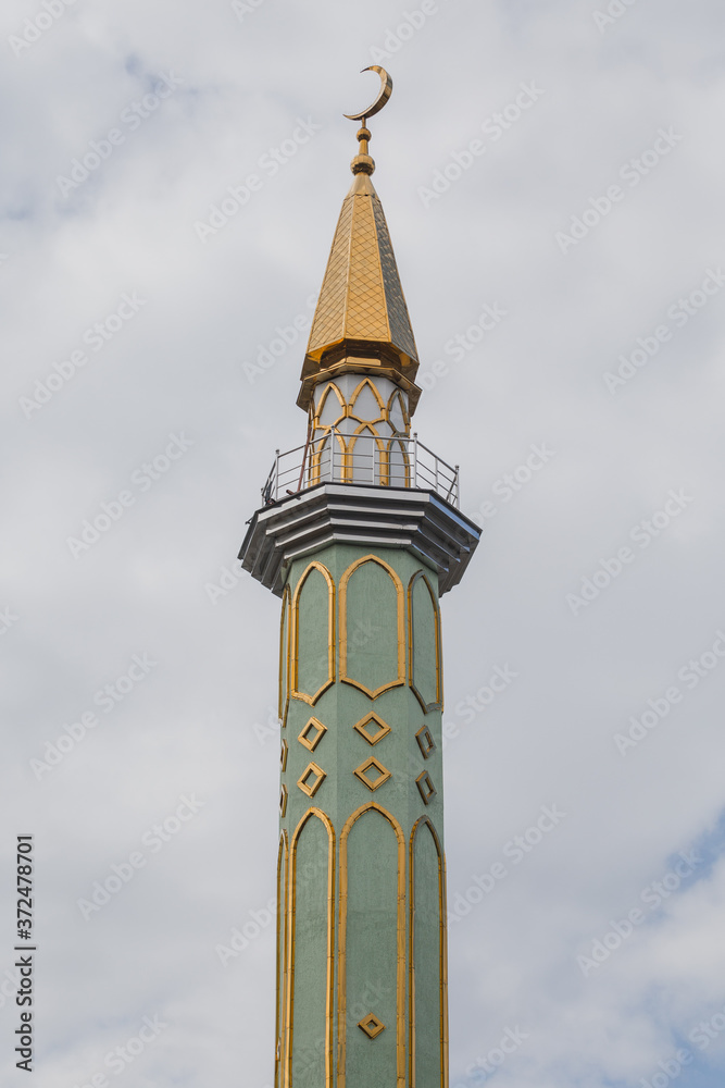 View of traditional mosque minaret tower, distinctive architectural ...