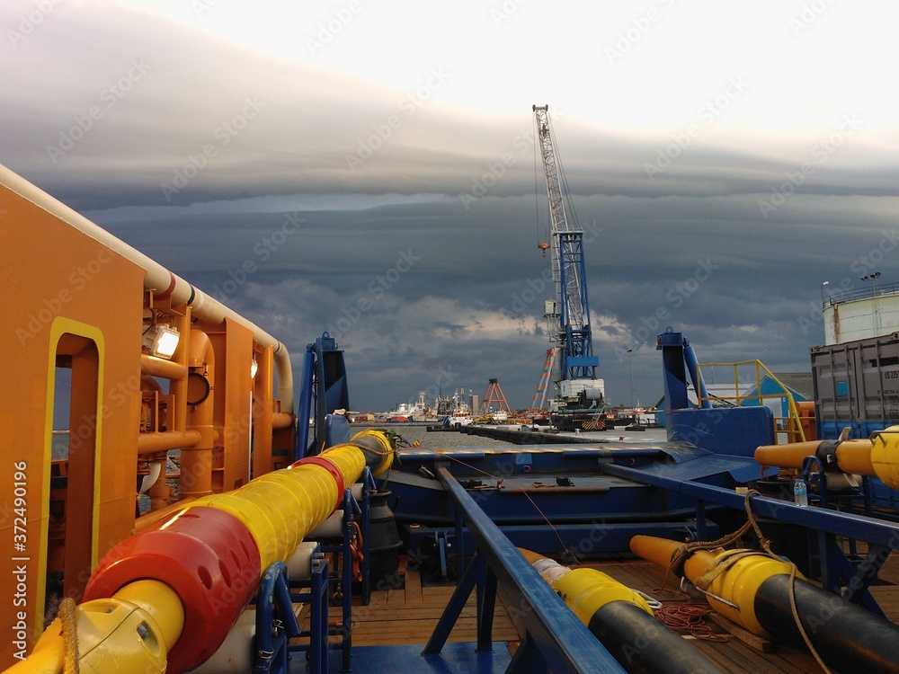 Cable-laying vessel lays cable at sea in a wind farm Stock Photo ...