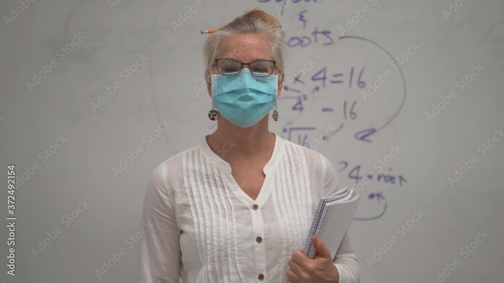 Portrait of sad mature woman math teacher with glasses fogging over ...