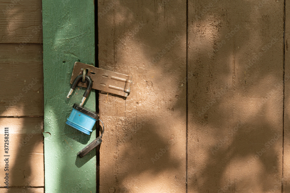 Open lock on a door latch Stock Photo | Adobe Stock