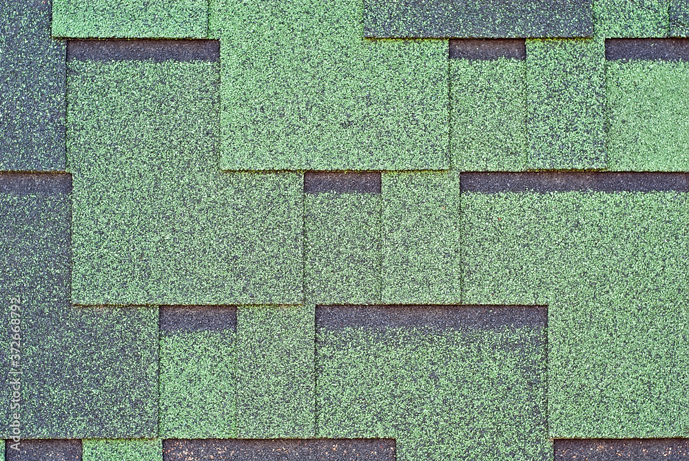 Flexible tile is made of fiberglass impregnated with bitumen. Green ...