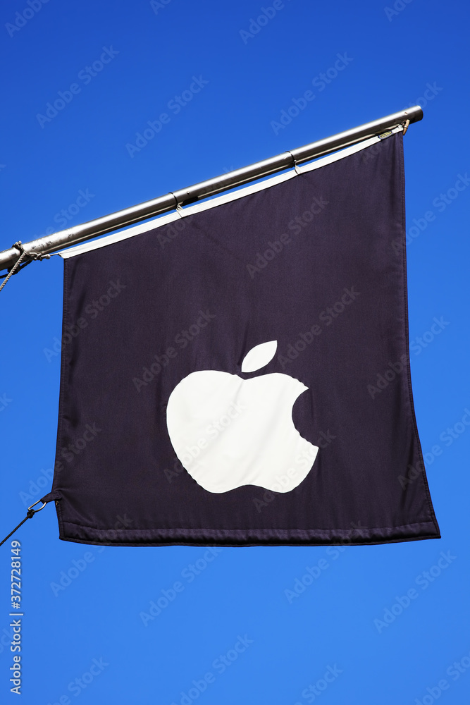 London, UK, April 1, 2012 : Apple computers logo sign flag flying ...