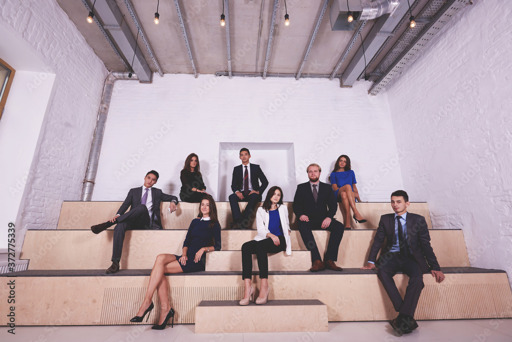 Foto de Successful group of business people dressed in luxury corporate ...
