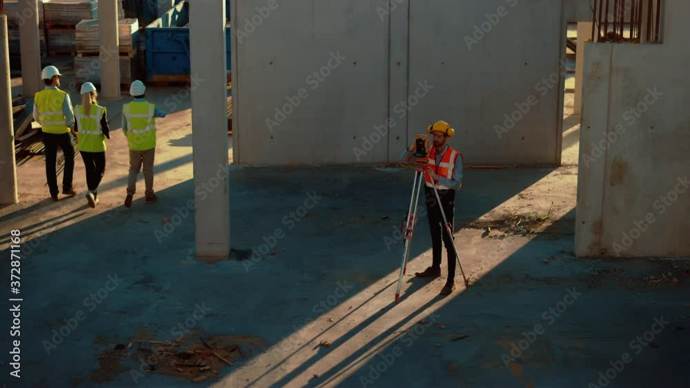 Construction Worker Using Theodolite Surveying Optical Instrument for ...