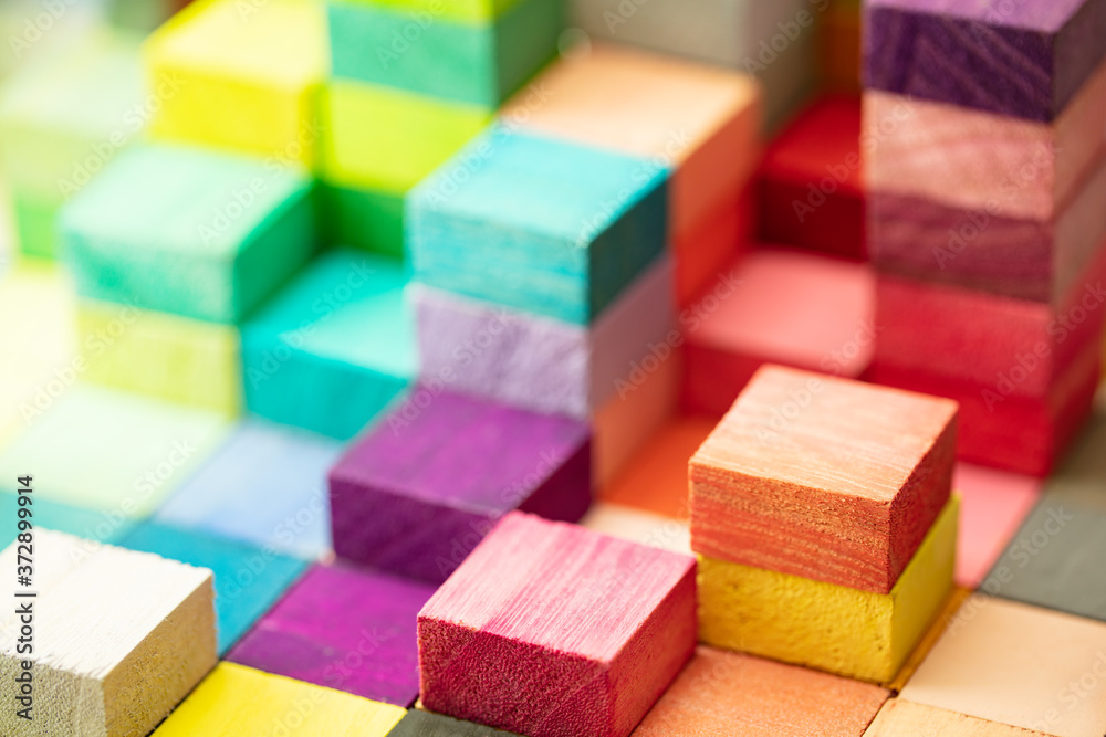 Poster Spectrum of stacked multi-colored wooden blocks – Wall Art ...