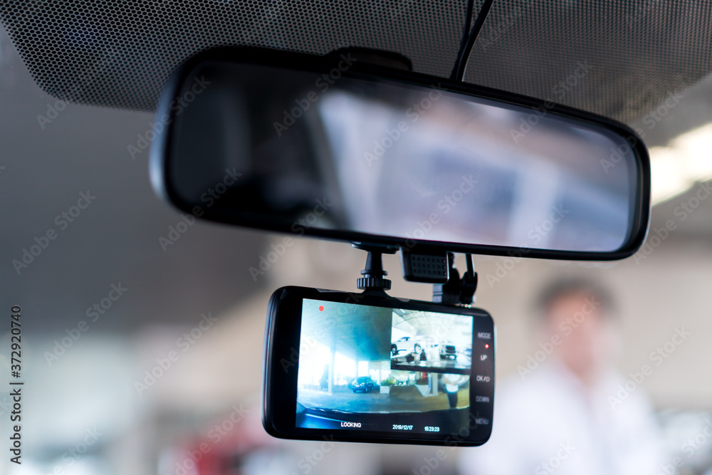 Fotka „Car camera cctv recorder dashboard with mirror glass for safety ...