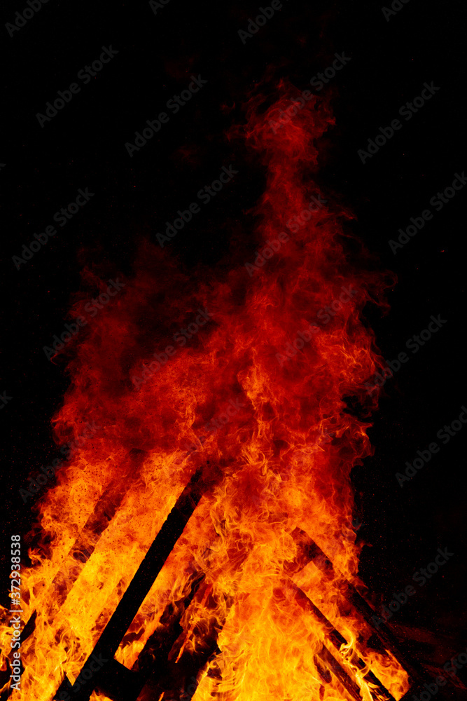 Bonfire of red fire made during the celebration of the feast of Sant ...