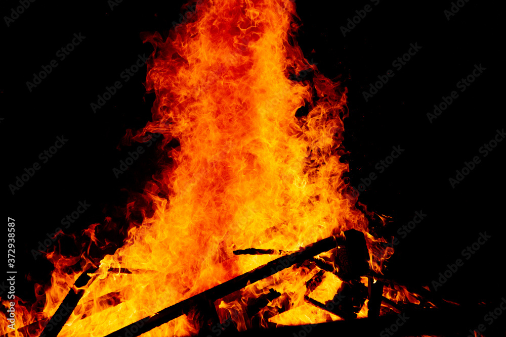 Bonfire of red fire made during the celebration of the feast of Sant ...