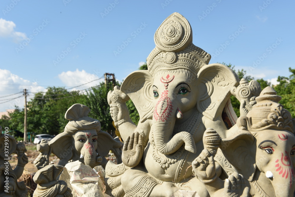 Clay statue of Indian God Ganesha being displayed on the occasion of ...