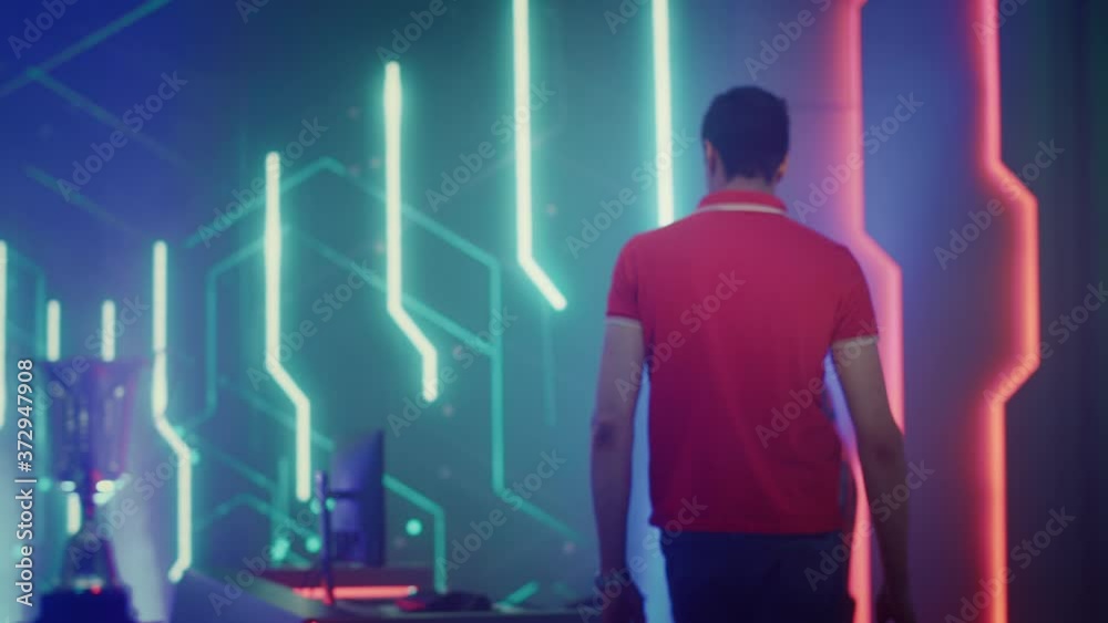 Professional eSports Gamer walking on Stage to Participate in the Cyber ...