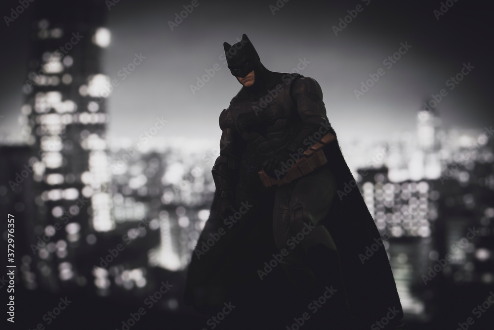 NEW YORK USA, AUGUST 21 2020: Batman from DC Comics looming over Gotham ...