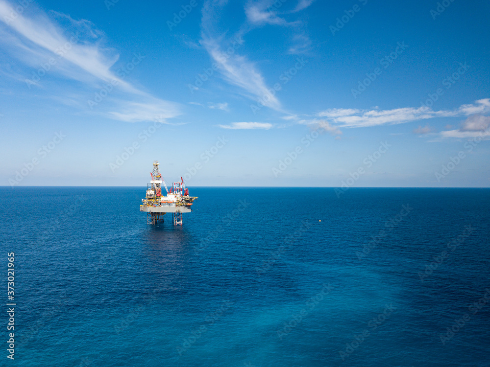 Aerial view from a drone of an offshore jack up rig at the offshore ...