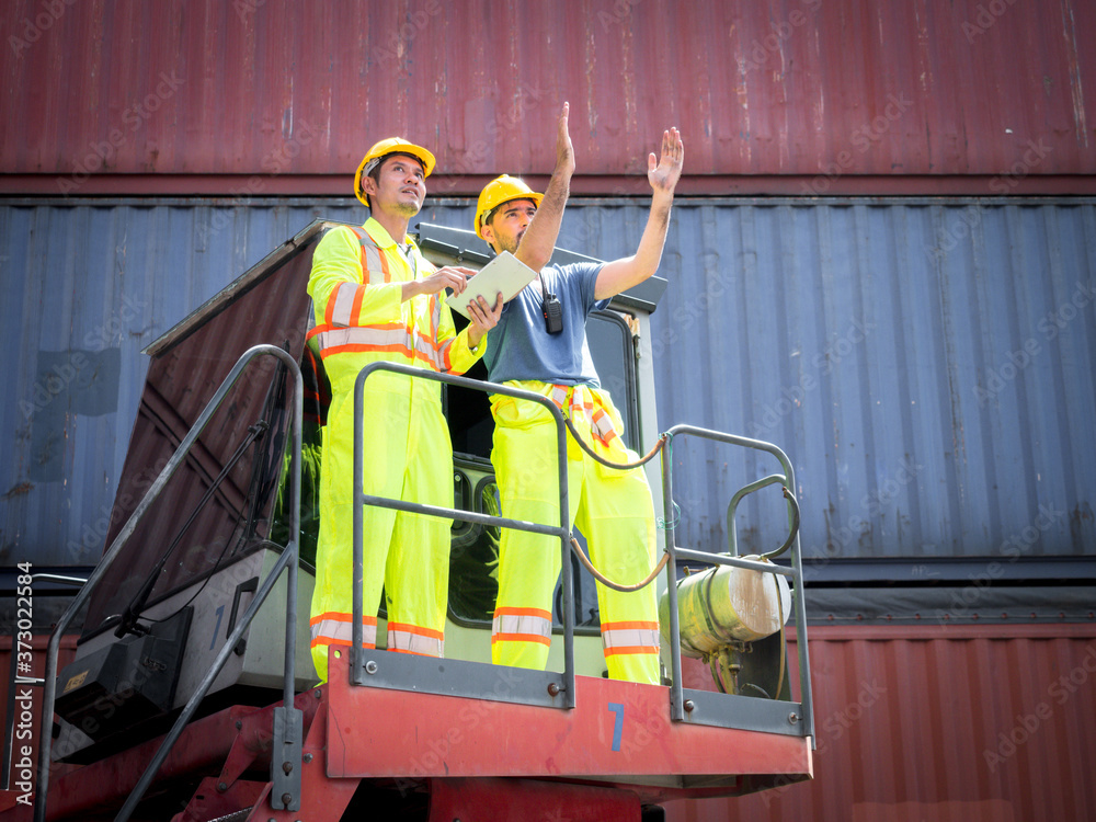 Two smart engineer man wearing safety helmet doing stock tick check and ...